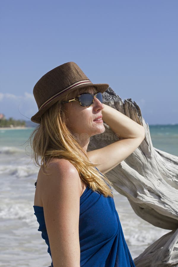Nice lady on the beach stock image. Image of branch, tanned - 29301541