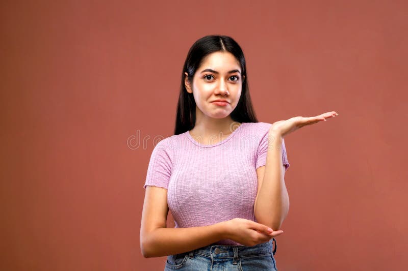 A Nice Lady Raising Her Hands while Posing in Front of the Camera ...