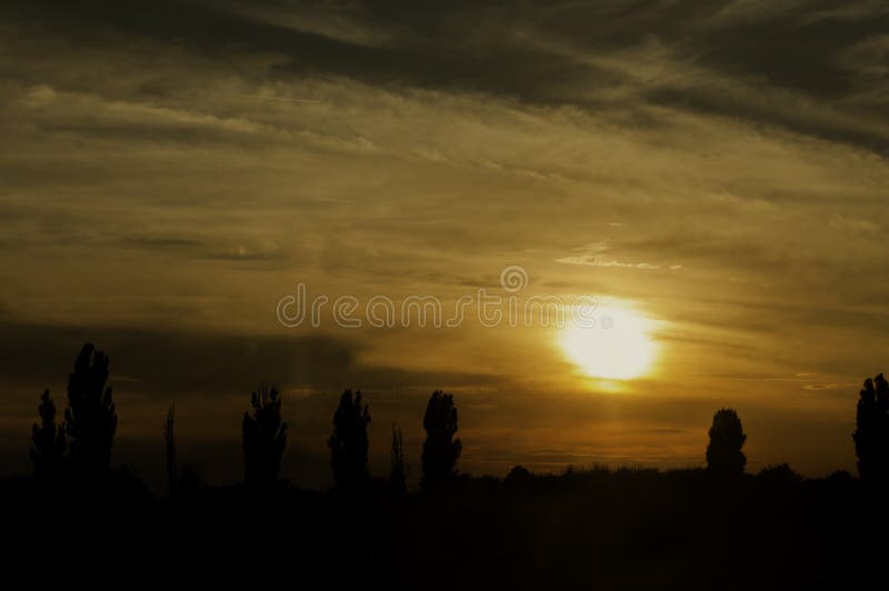 Nice Landscape in the Evening Warm Sun, with Dramatic Clouds Stock ...