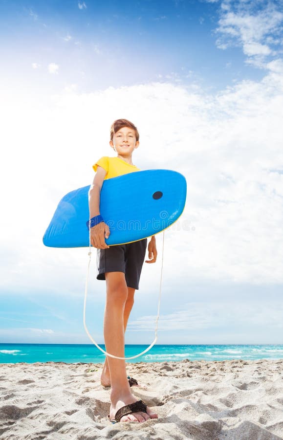 Boys with Body Boards Preparing To Ride the Wave Stock Image - Image of ...