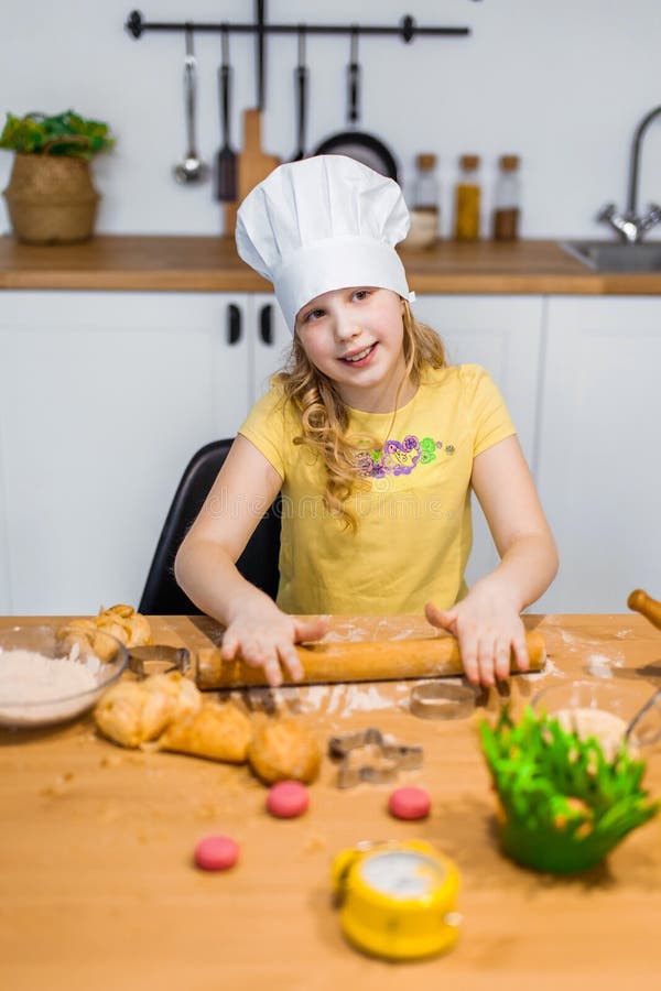 Nice Little Girl Baking at Home with Rolling Pin Stock Photo - Image of ...
