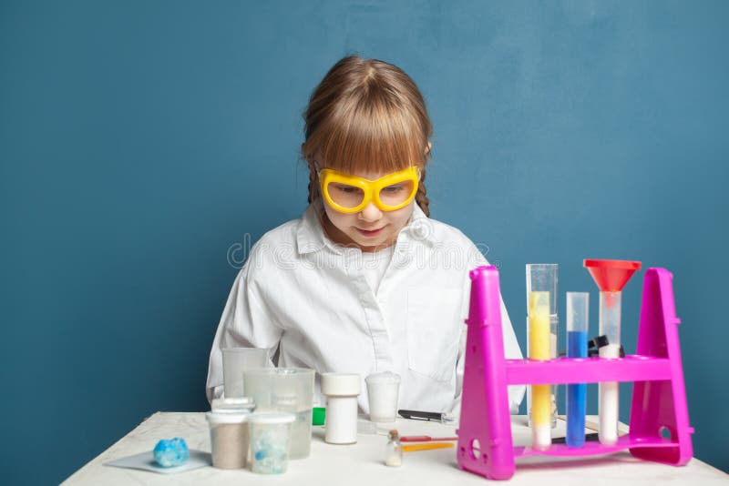 Nice Little Girl Looking at Flask and Science Equipment Stock Photo ...