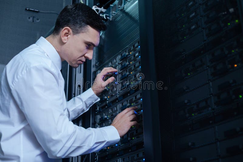Nice Male Engineer Checking the Network Server Stock Image - Image of ...