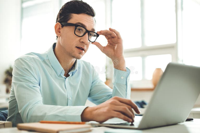 Nice Male Programmer Working on the Laptop Stock Photo - Image of ...
