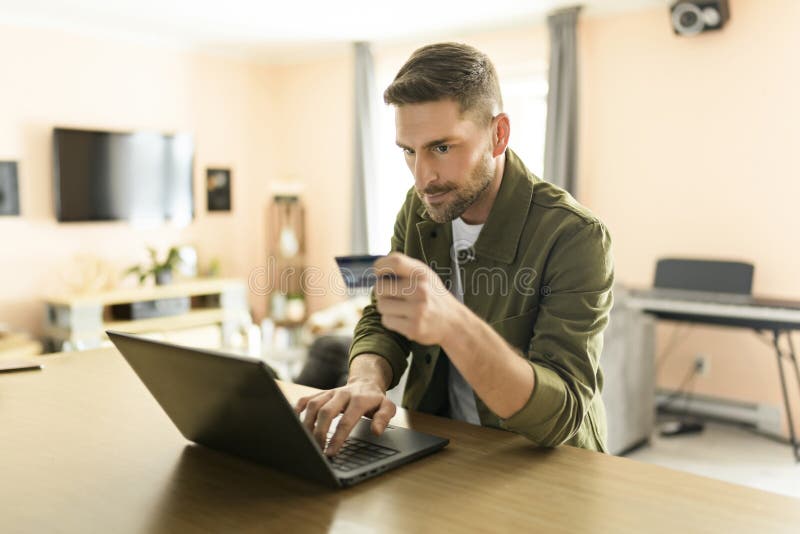 Nice Man Making Order on His Laptop at Home Stock Image - Image of ...