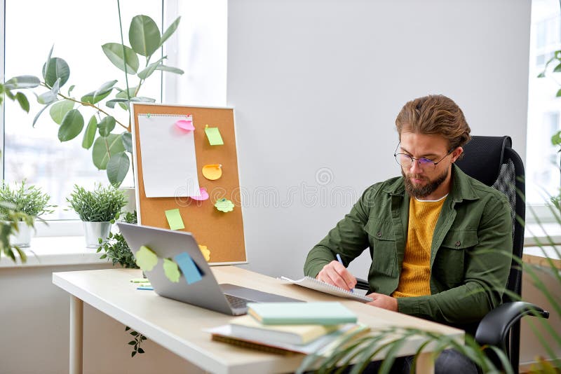 Nice Man Office Worker Concentrated on Work, Writing Documents ...