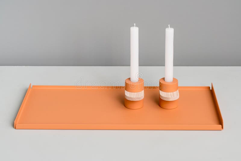 Metal Orange Support and Candlesticks Stock Photo - Image of wall ...