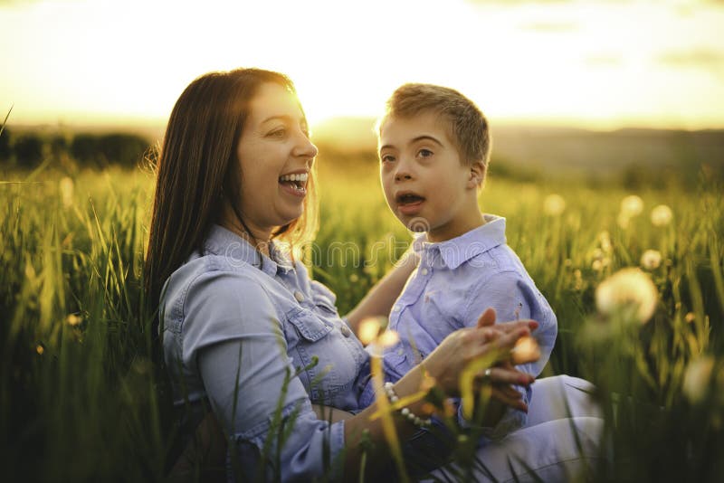 Nice Mother and Child Playing on Great Field at Sunset Stock Photo ...