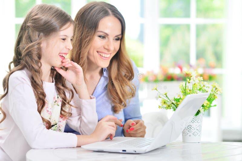 Nice Mother and Daughter with Laptop Computer Stock Photo - Image of ...