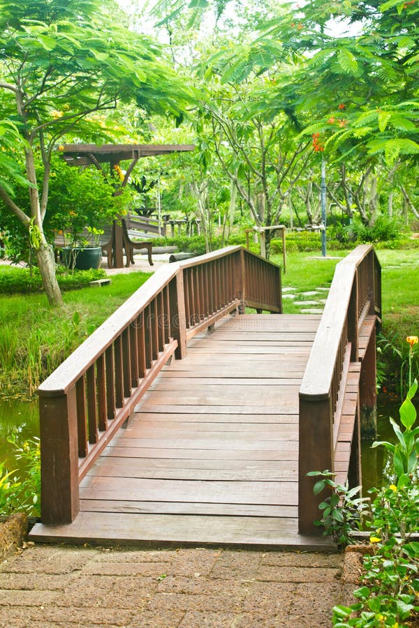 Nice Old Wooden Bridge in Park at Summertime. Stock Image - Image of ...