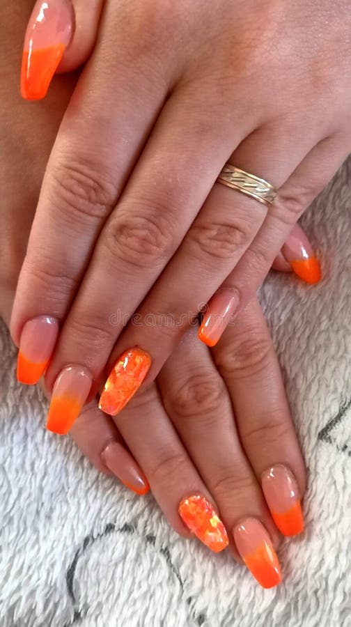 Nice orange hand nails stock image. Image of manicure - 189989427