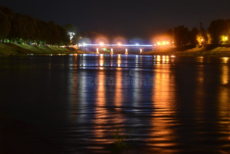 River at night time stock photo. Image of river, trees - 124437516