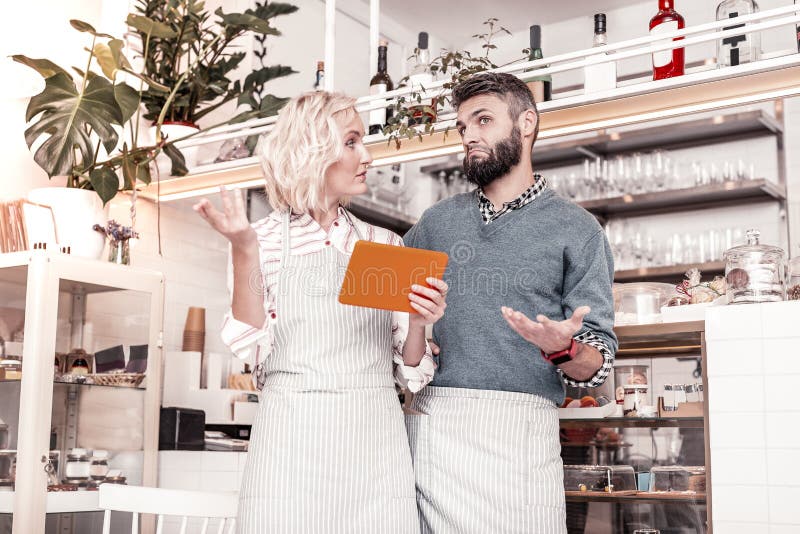 Nice Pleasant Colleagues Discussing Their Ideas Together Stock Image ...