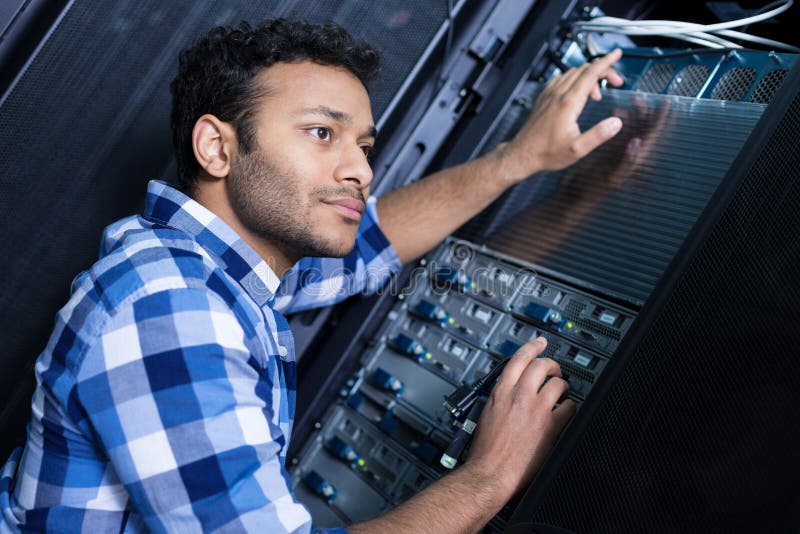 Nice Pleasant Man Focusing on His Work Stock Photo - Image of equipment ...