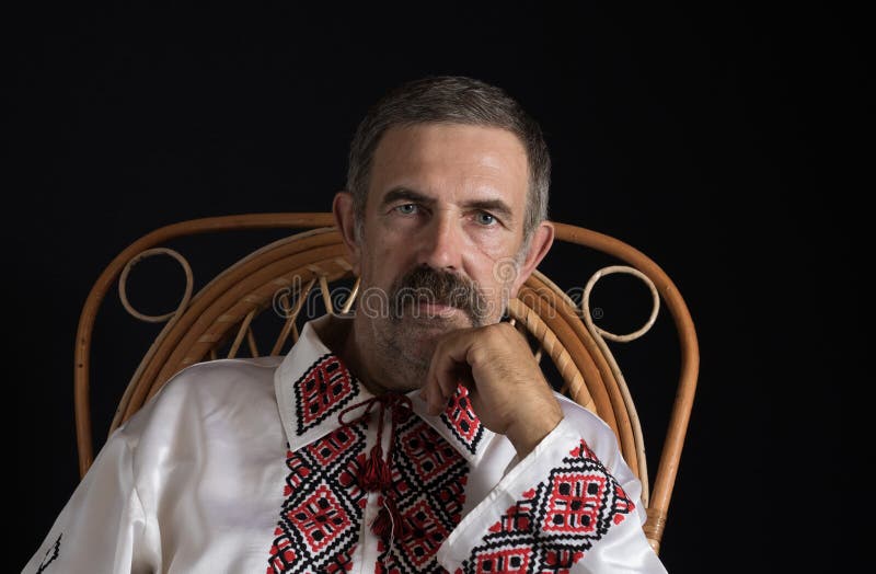 Nice Portrait of Ukrainian Country-man Sitting in a Wicker Chair ... Nice Portrait of Ukrainian Country-man Sitting in a Wicker Chair ...