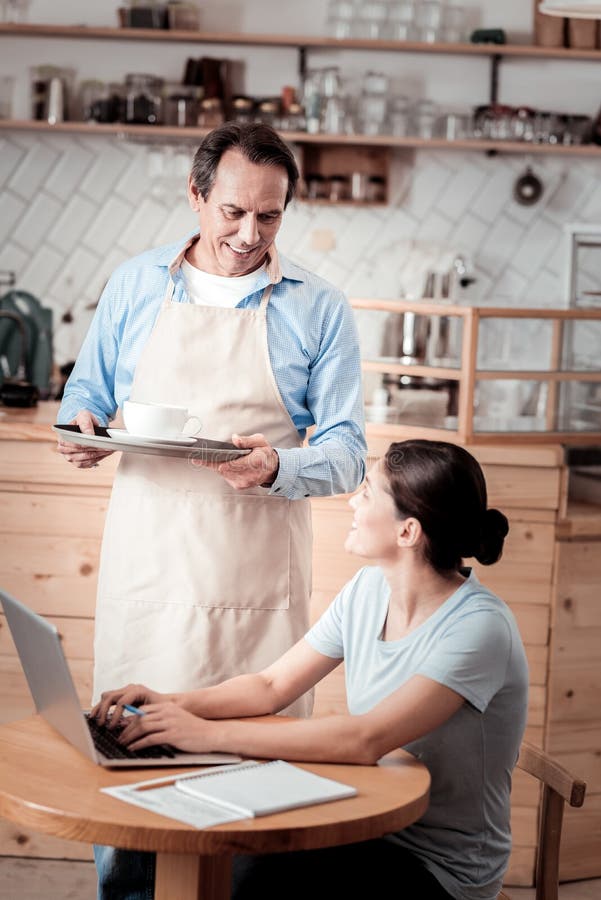 Nice Positive Waiter Serving the Customer Stock Image - Image of ...