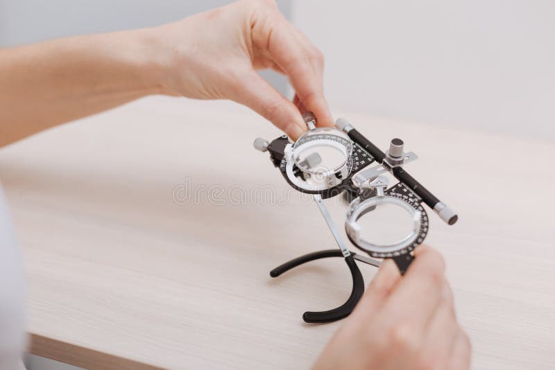 Nice Professional Doctor Holding Eye Test Spectacles Stock Photo ...