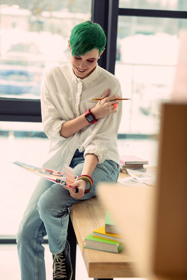 Nice Professional Female Designer Holding Her Drawing Stock Photo ...