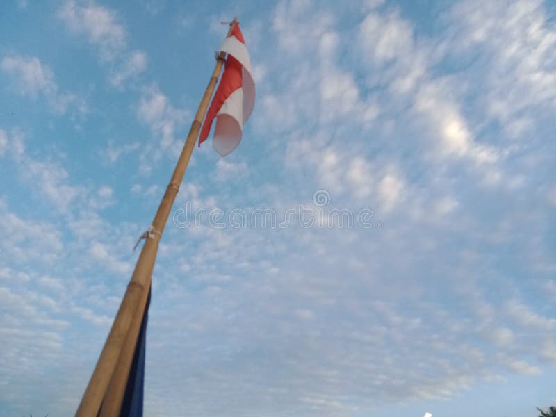 Nice Red and White Flag on a Blue Sky Stock Image - Image of blue ...