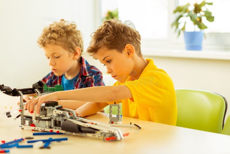 Nice Serious Boys Being Focused on Their Work Stock Photo - Image of ...