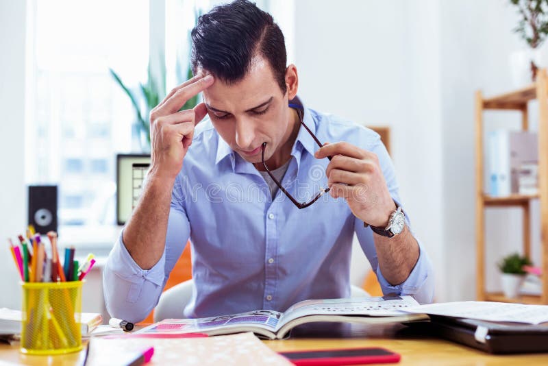 Nice Serious Man Looking into the Book Stock Image - Image of ...