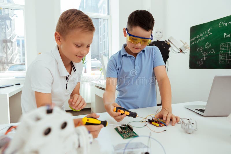 Nice Smart Boys Being in the Class Stock Photo - Image of device ...