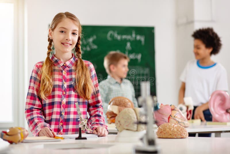 Nice Smart Girl Standing at the Table Stock Photo - Image of educated ...