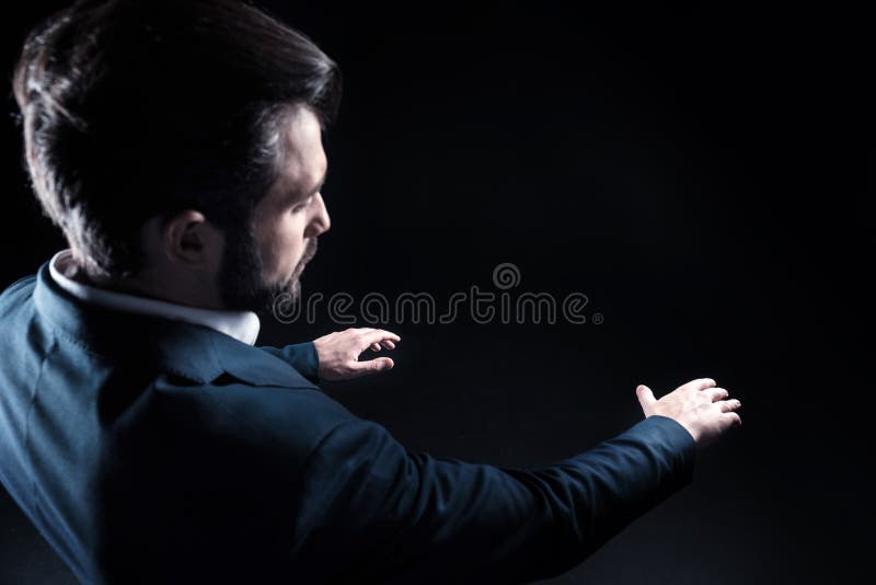 Nice Smart Man Looking at His Hands Stock Photo - Image of interaction ...