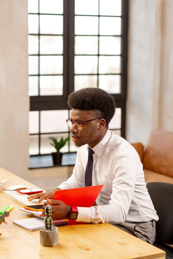 Nice Smart Man Sitting at the Office Desk Stock Photo - Image of ...