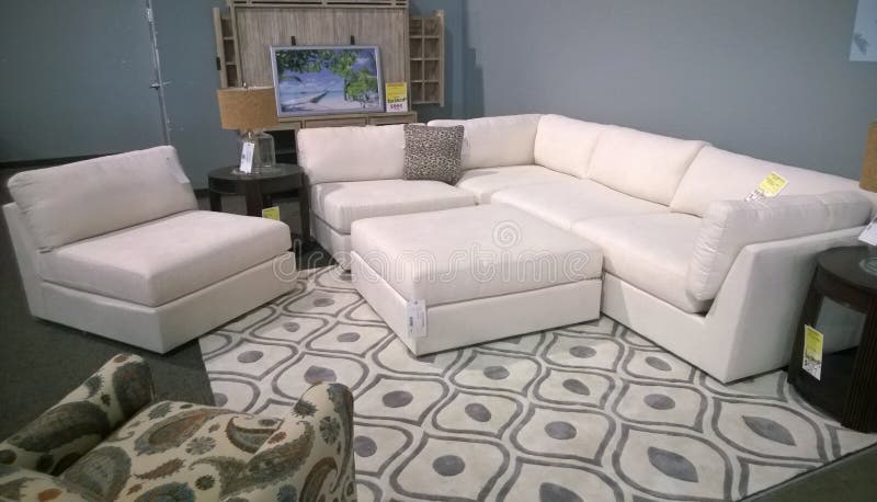 Nice sofa selling at store editorial image. Image of interior - 48208040