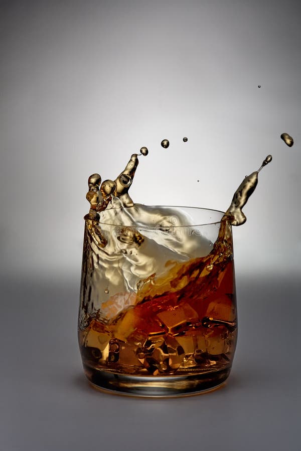 Nice Splash in Glass with Whisky Stock Photo - Image of bubbles, scotch ...