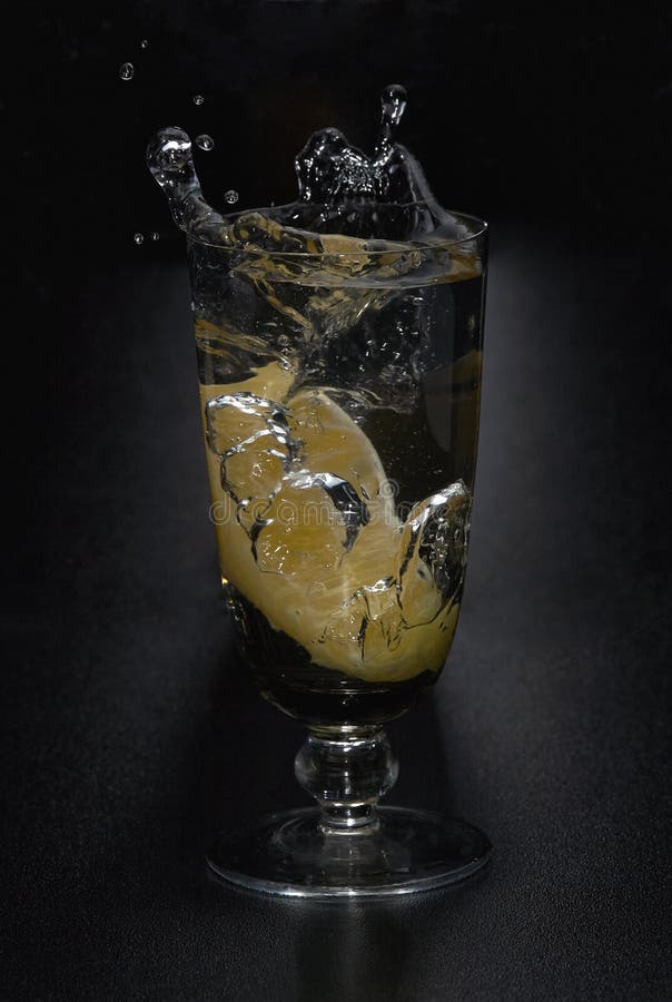 Nice Splash with Orange Slice Stock Image - Image of bubbles ...