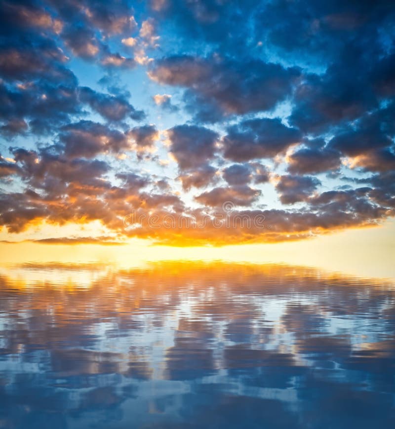A Nice Sunset with the Clouds Reflecting Stock Image - Image of outdoor ...