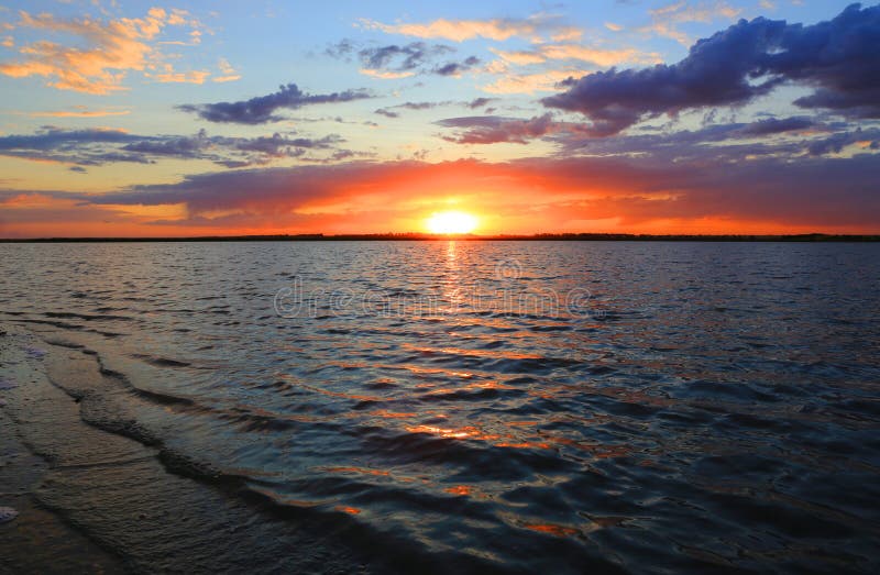 Sunset over water surface stock photo. Image of outdoor - 18238076