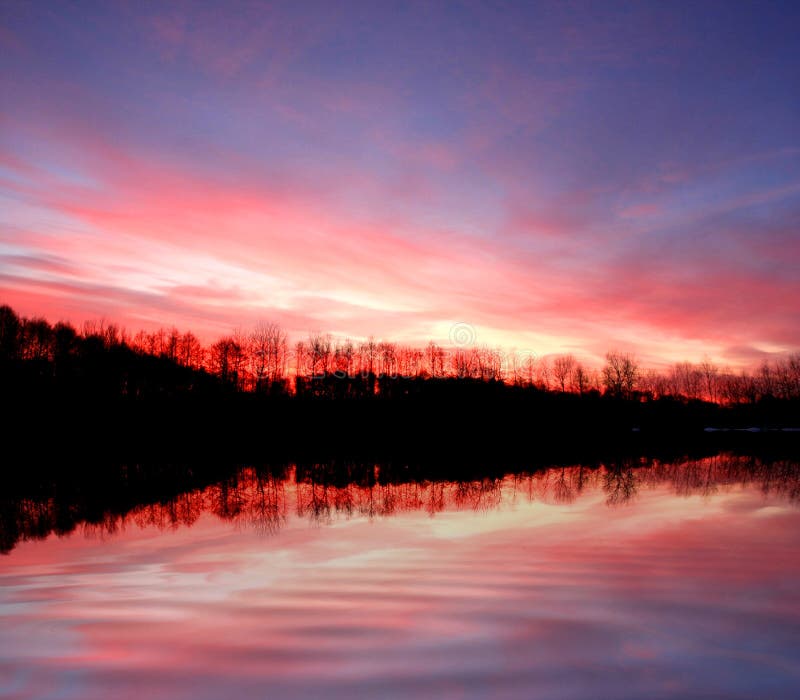 Nice sunset on the river stock photo. Image of fire, colors - 7727798