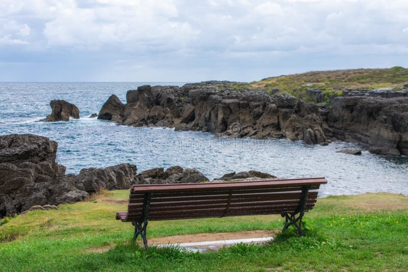 Nice View of a Bench in Front of the Sea Coast Stock Photo - Image of ...
