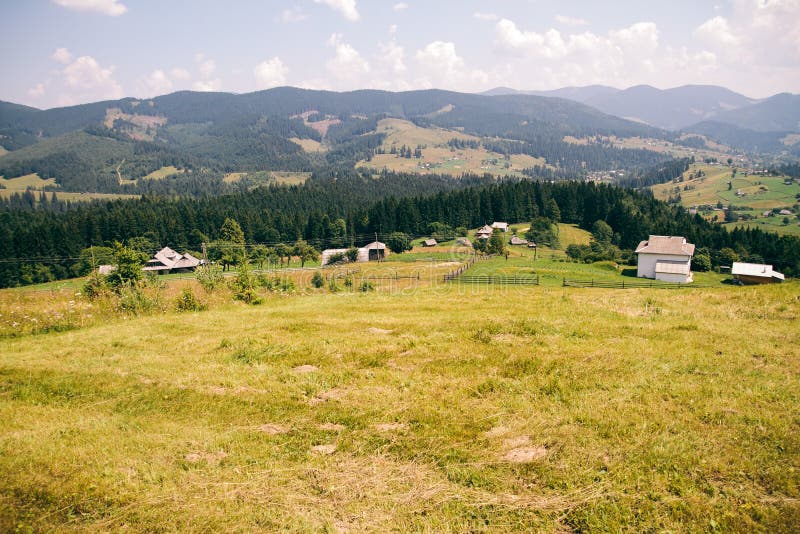 Nice View in the Mountains. Many Farm Houses and Forest Stock Image ...