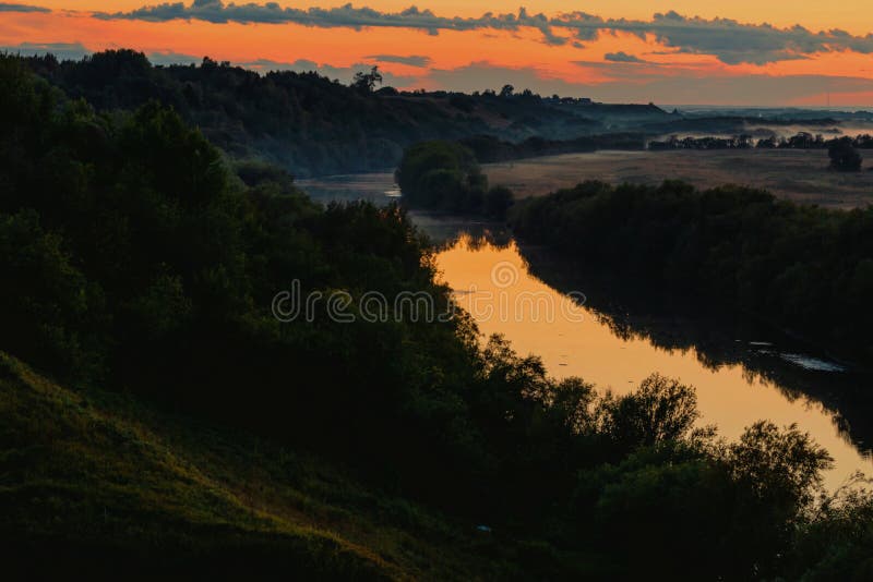 Nice View of the River among the Trees Reflecting the Orange Sky at ...