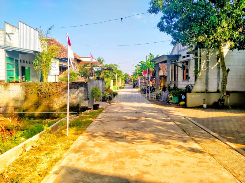 Road in Indonesian village stock image. Image of blue - 320888977