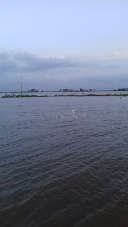 Nice Village View with Water and Sky. Stock Image - Image of cloud ...