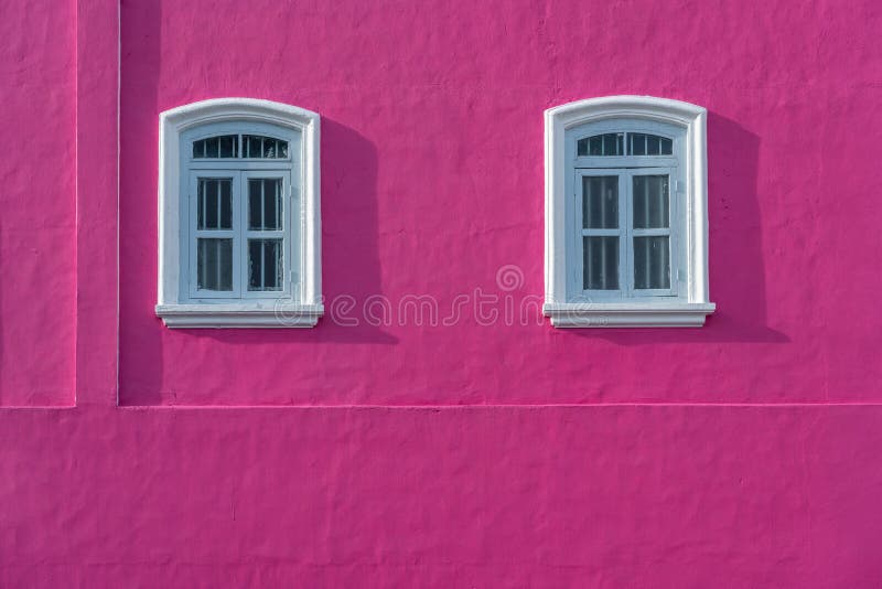 White windows on pink wall stock image. Image of exterior - 167864941