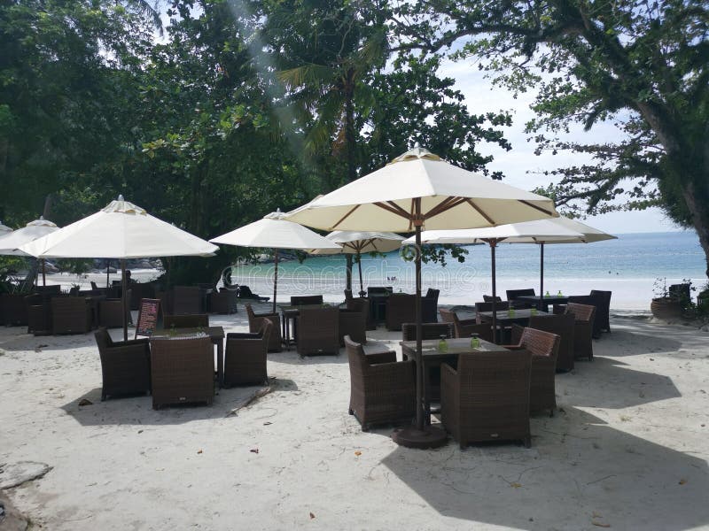 Nice Wooden Dining Table at Beachfront Stock Photo - Image of romantic ...
