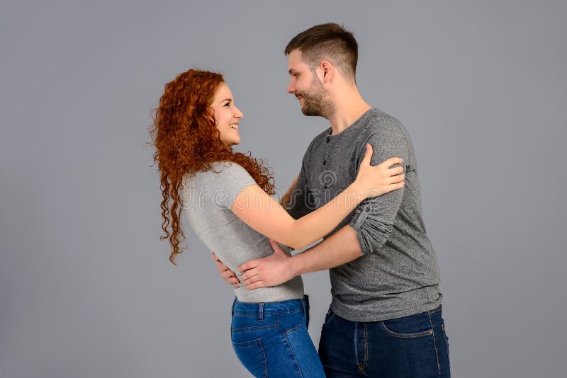 Nice Young Couple in the Studio Stock Photo - Image of pretty, flirting ...