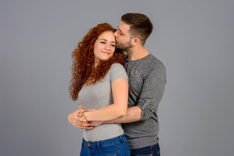 Nice Young Couple in the Studio Stock Image - Image of hugging, couple ...