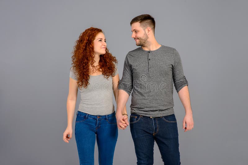 Nice Young Couple in the Studio Stock Image - Image of couple, casual ...
