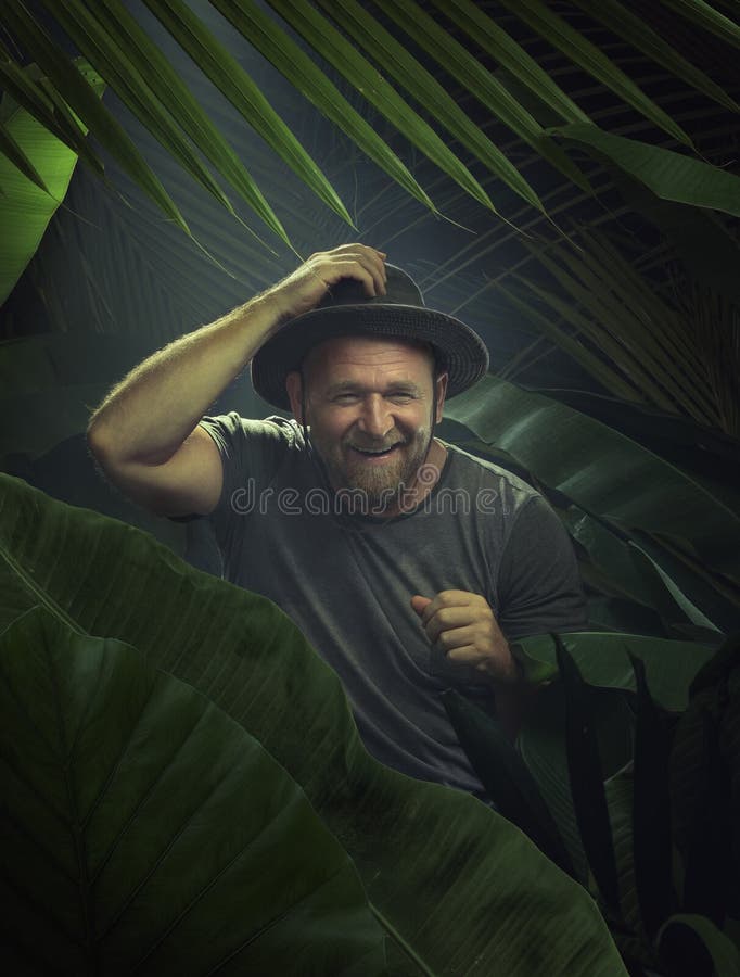Nice Young Man Exploring Jungle Environment Stock Photo - Image of ...