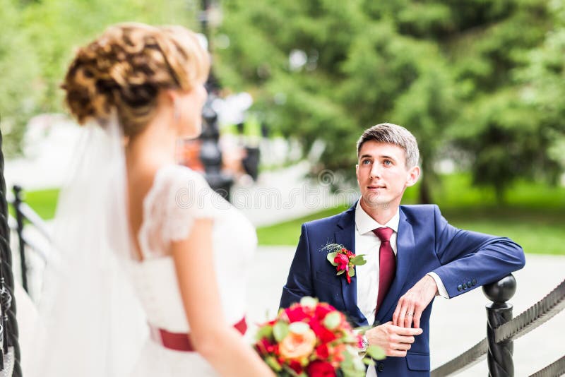 Nice Young Wedding Couple Outdoors Stock Image - Image of people, long ...