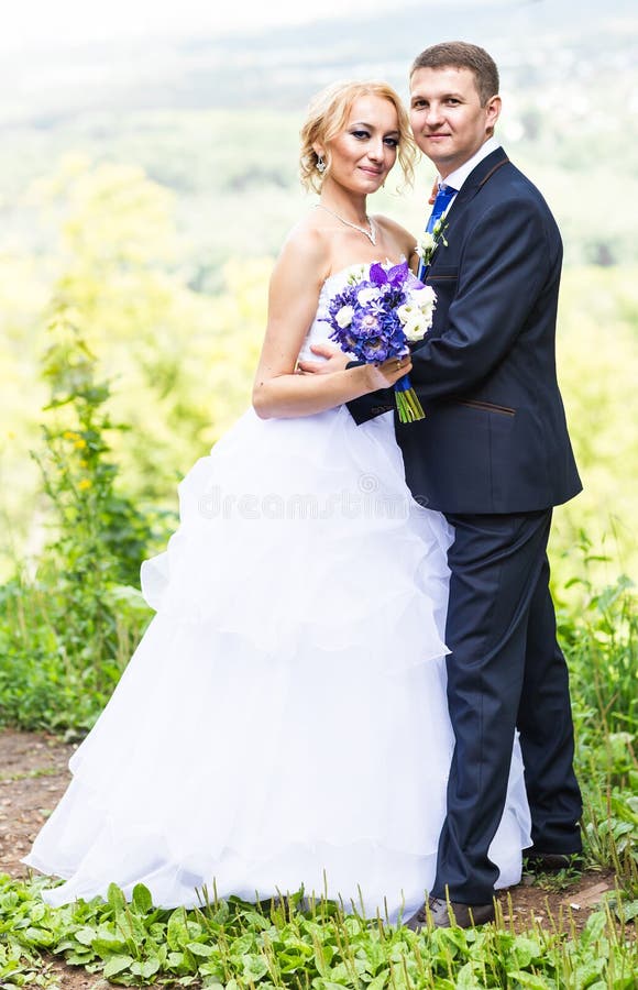 Nice Young Wedding Couple Outdoors Stock Image - Image of marriage ...