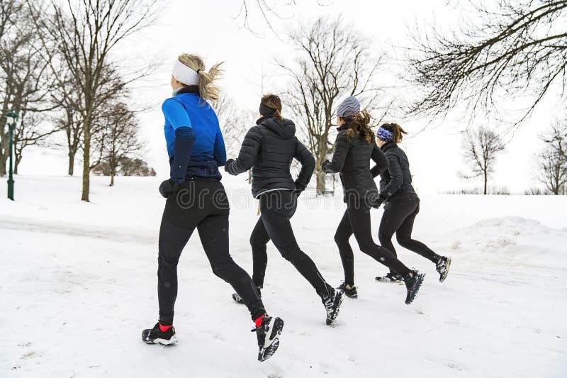 Nice Young Woman Running in Snowy Park Stock Photo - Image of female ...