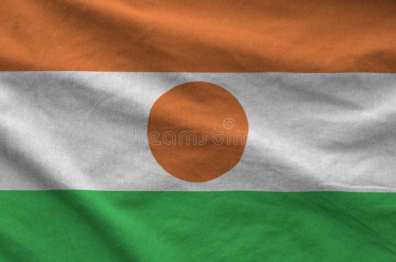 Niger Flag Depicted on Folded Wavy Fabric of Old Cloth Stock Photo ...